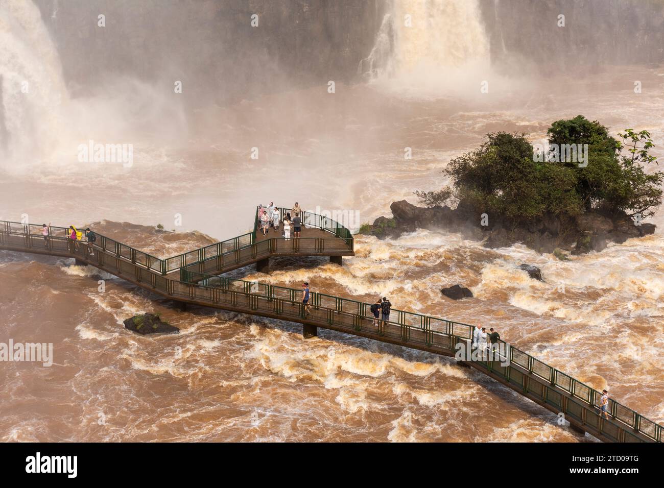 Beautiful view to walking path over strong waterfalls in Iguazu Stock ...