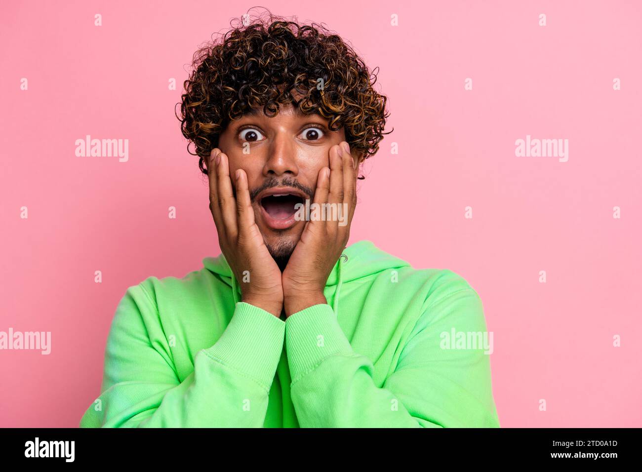 Portrait of hipster young guy shocked touch cheeks girlfriend bought ...