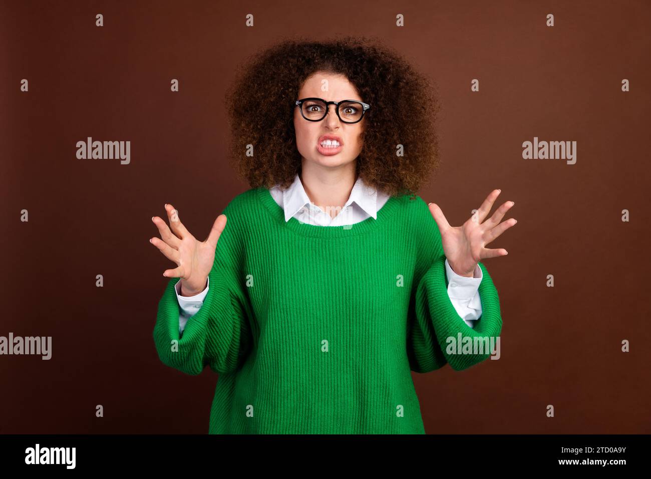 Portrait of outraged unsatisfied girl raise hands grin teeth ...