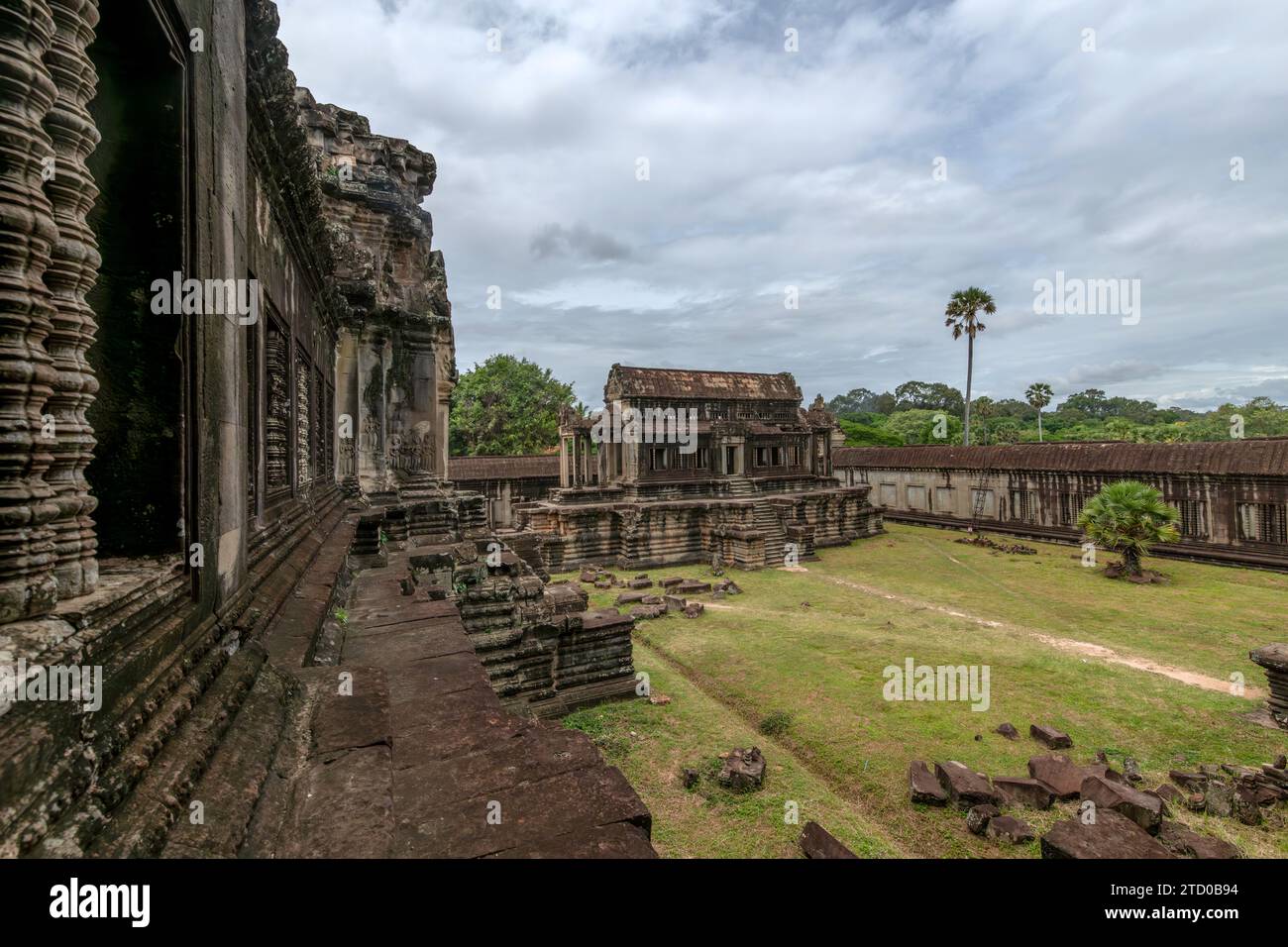 Mysterious ruins of the Angkor Wat complex standing still against time ...