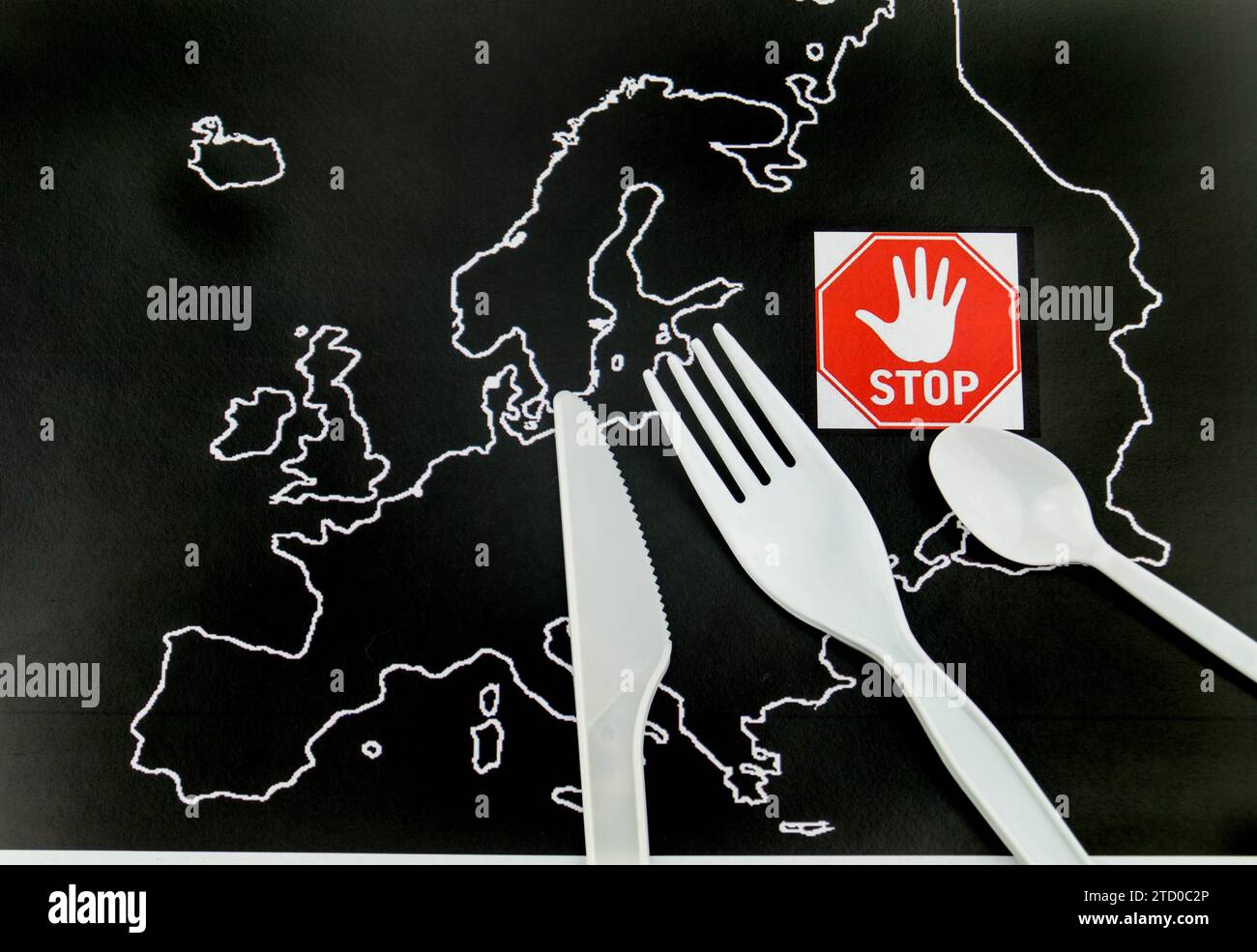 plastic cutlery on map of Europe with stop sign, ban on plastic in the ...