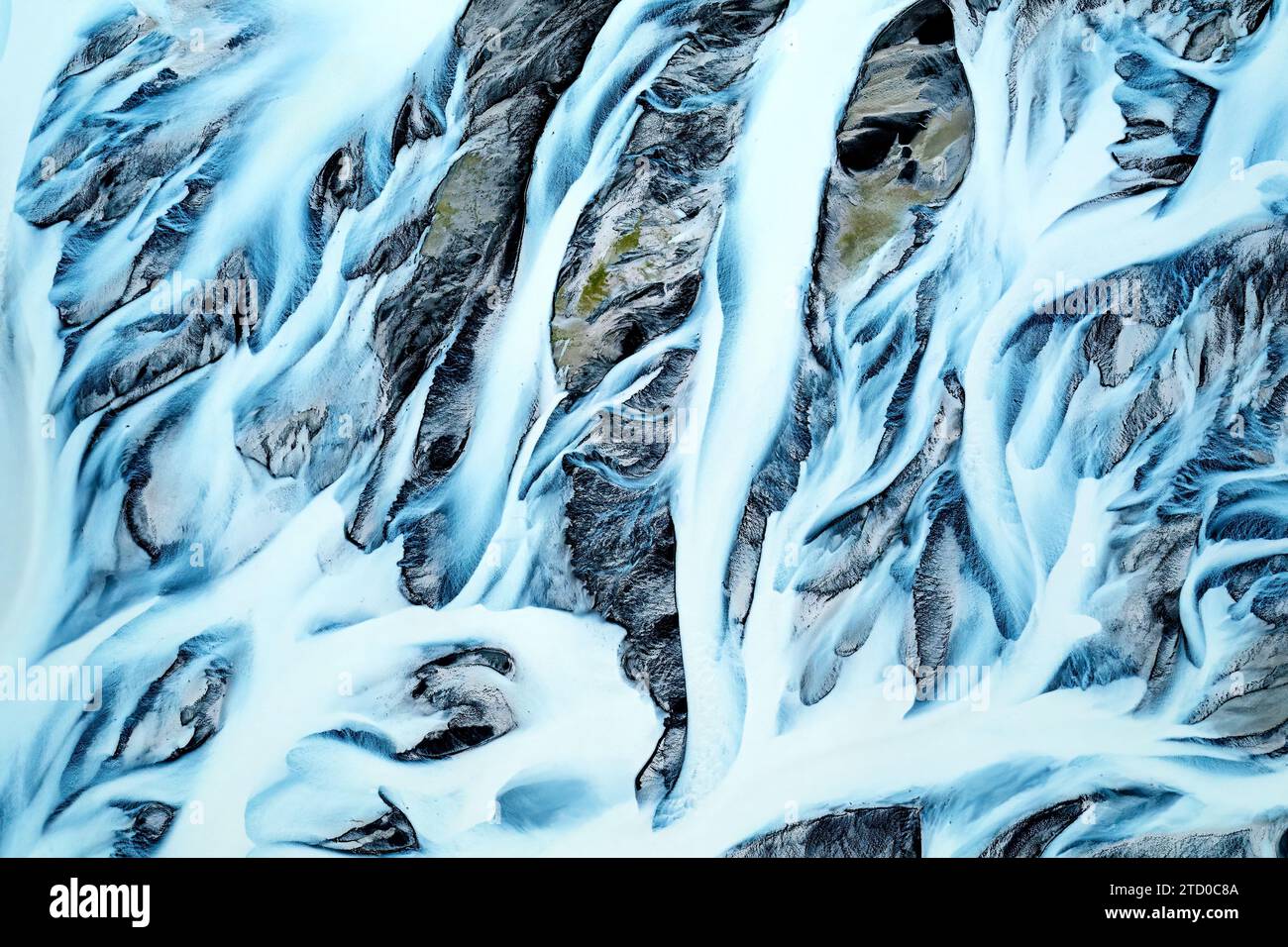 Aerial view of intricate river basins in Iceland, showcasing the ...