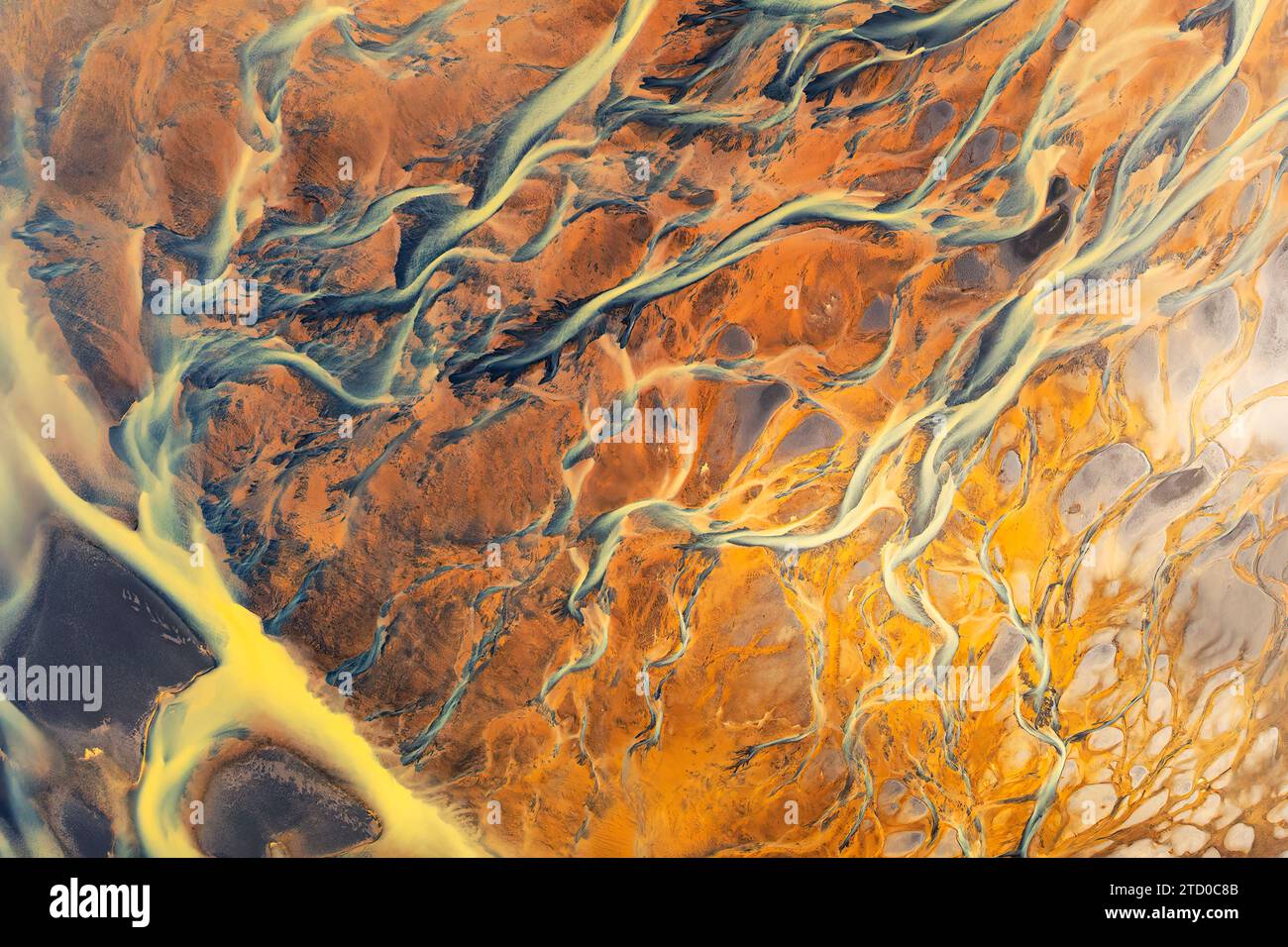 Aerial view capturing the intricate patterns of Icelandic river basins ...
