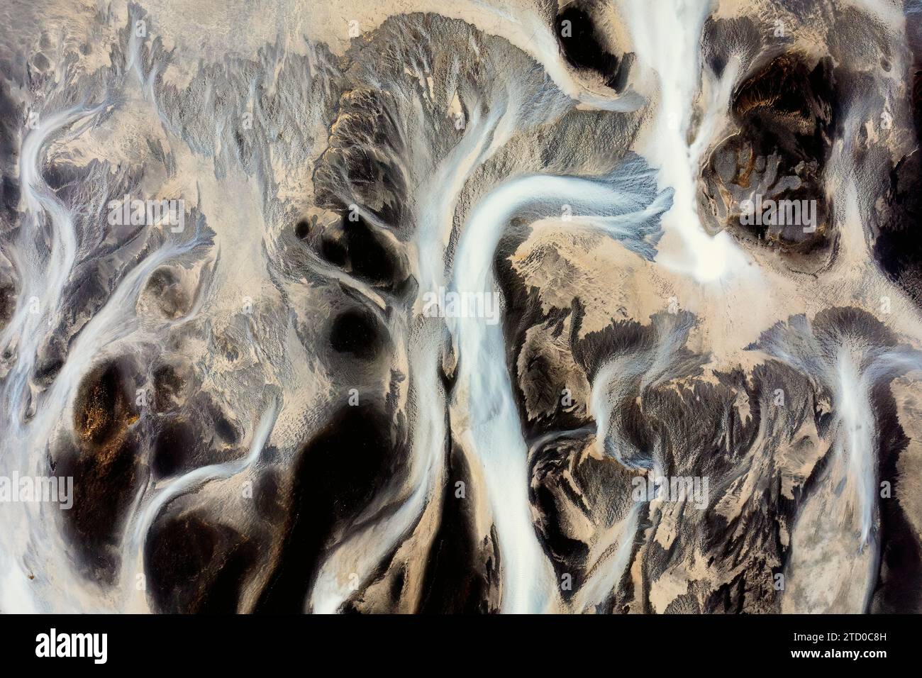 An aerial shot captures the complex patterns of an Icelandic river ...