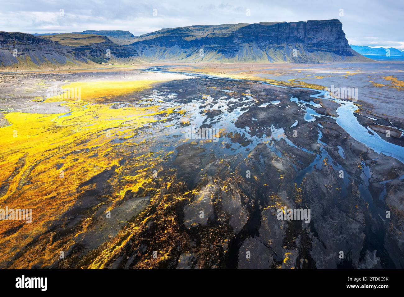 An aerial shot captures the breathtaking river basin in Iceland, set ...