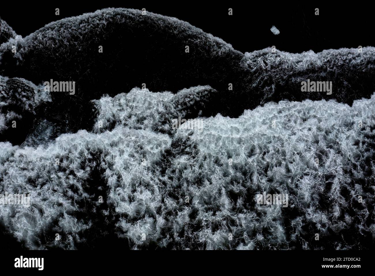 Close-up of an Icelandic river basin showing the intricate textures of ...