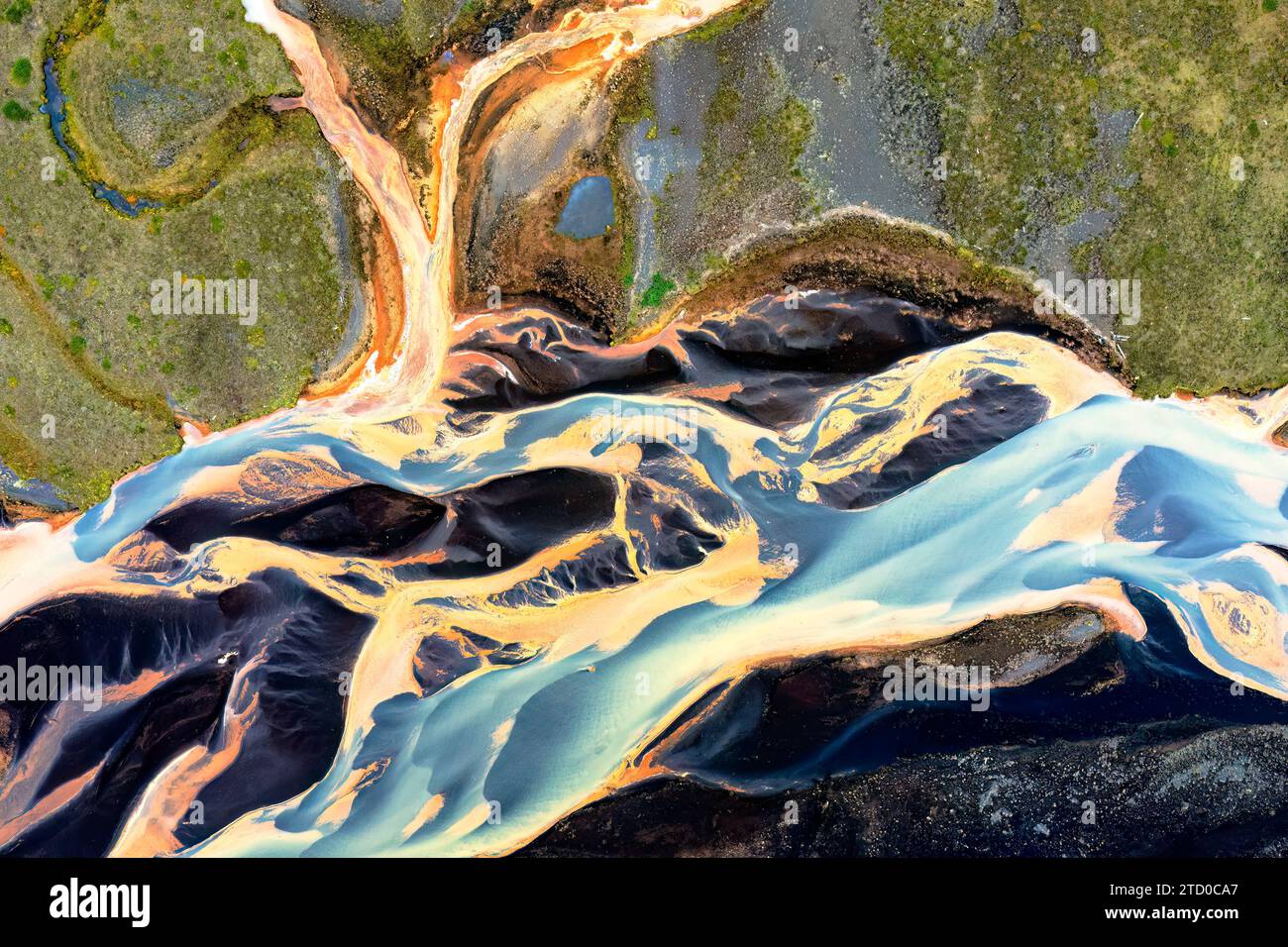 This striking aerial shot captures the complex beauty of a river basin ...