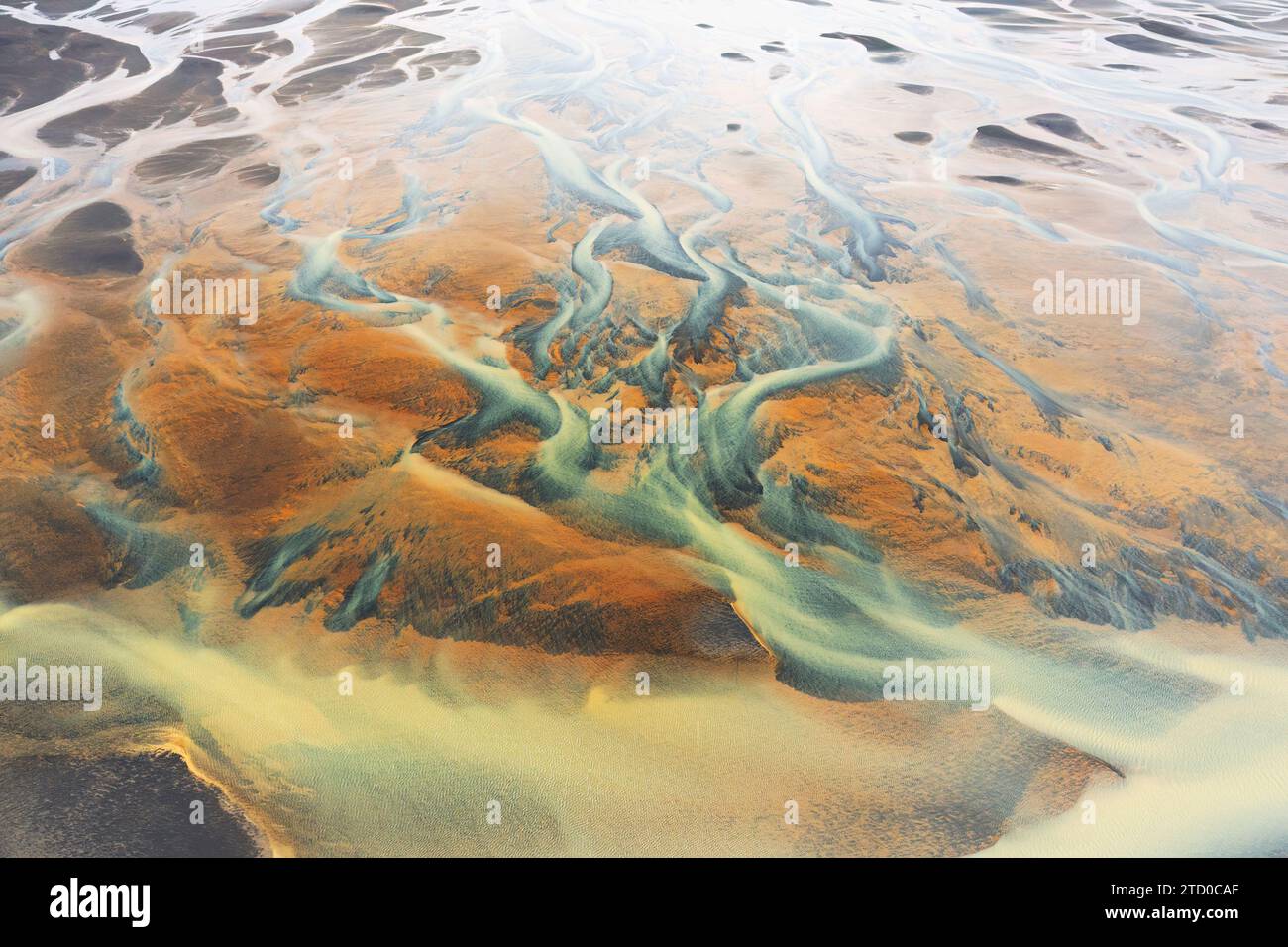 Abstract aerial view of a river basin in Iceland, with intricate ...