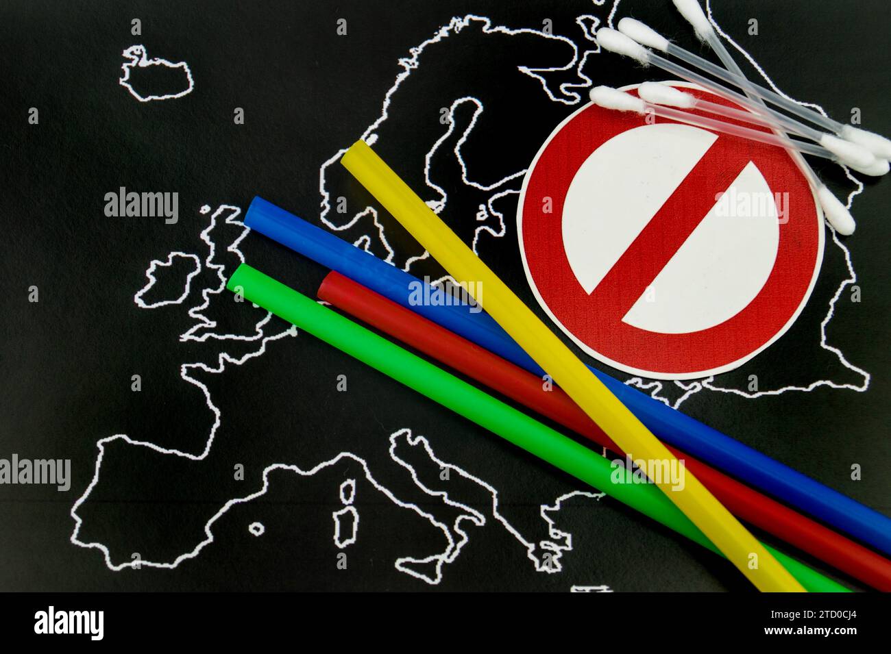 Plastic straws and cotton buds on a map of Europe with a prohibition ...