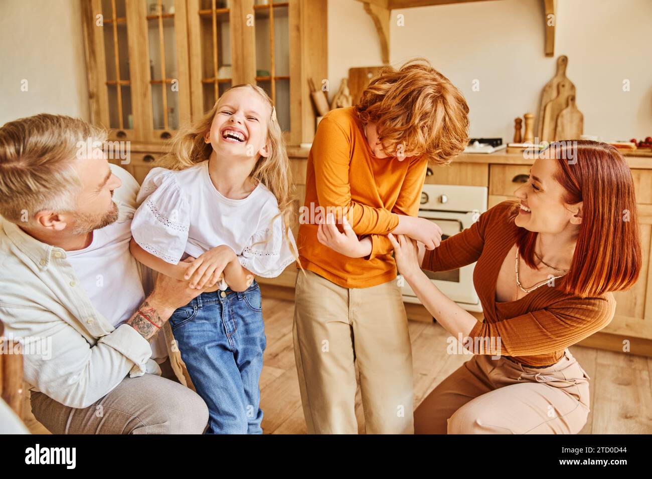 Tickling laughing hi-res stock photography and images - Alamy