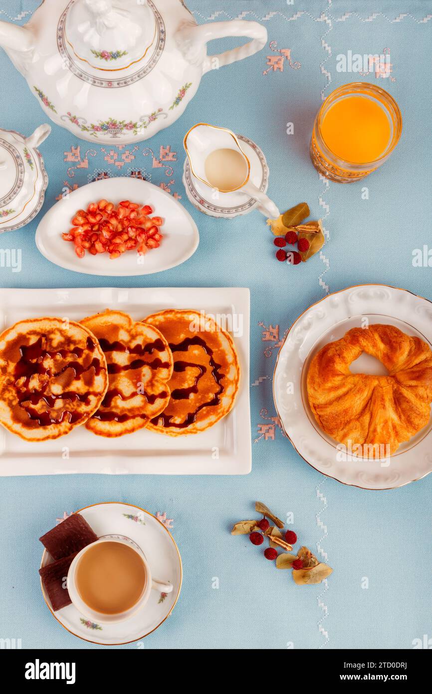 A top view of a continental breakfast arrangement with waffles, fruits ...