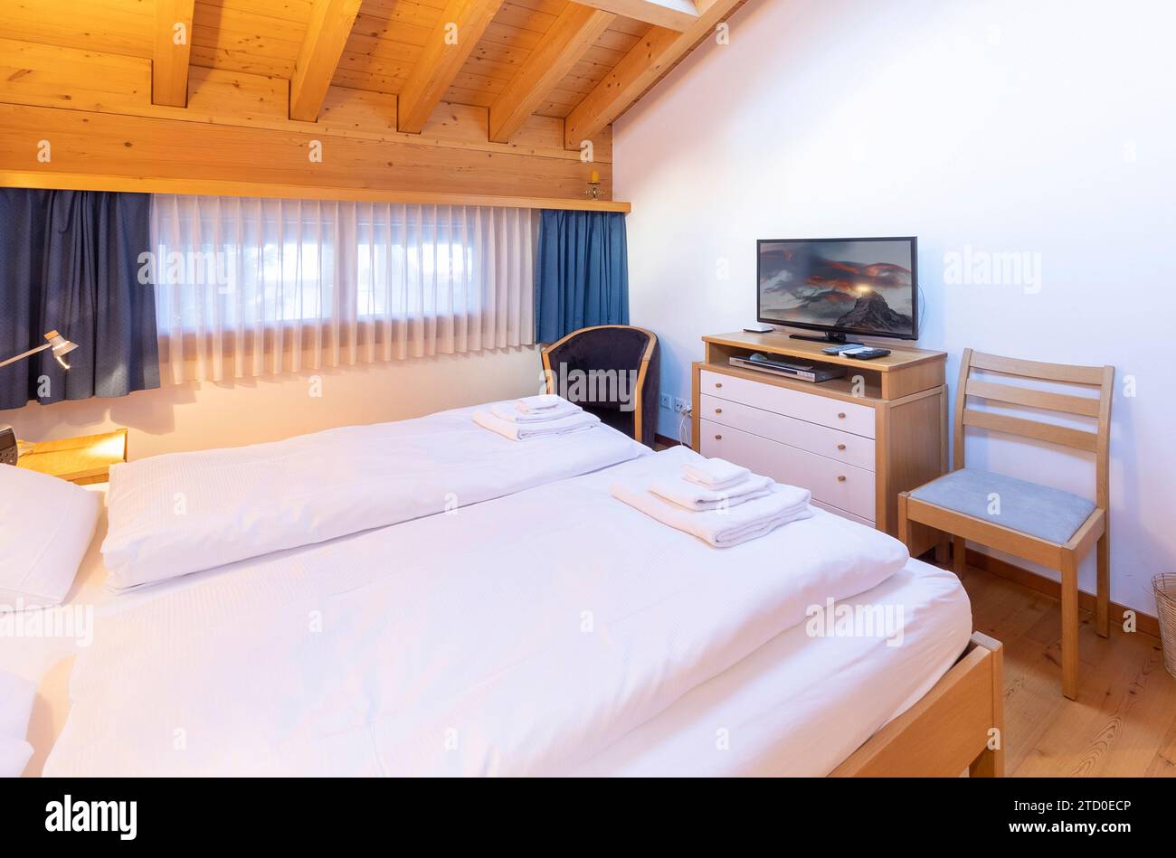 Cozy alpine bedroom interior with wooden accents and comfortable ...