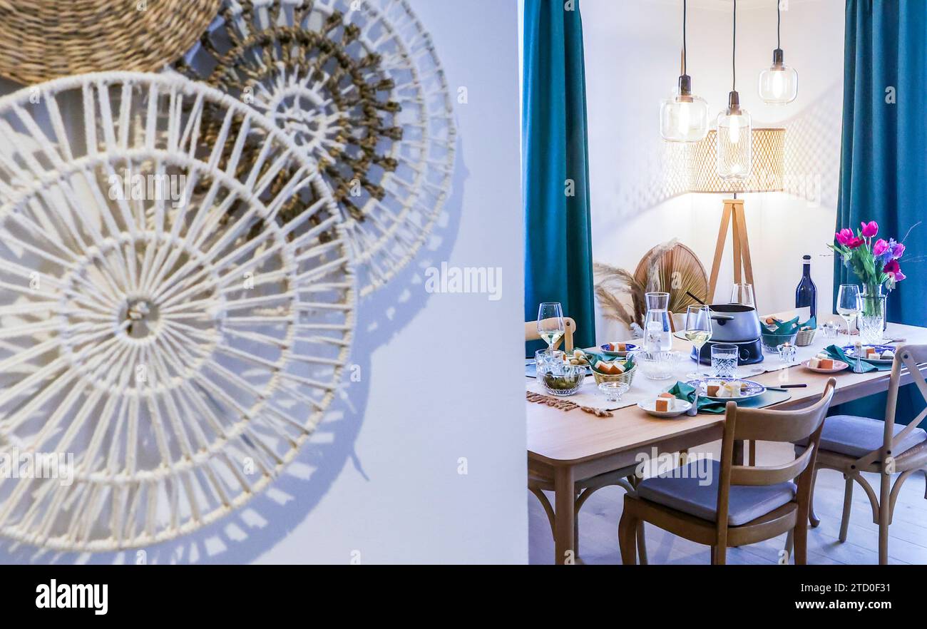 A stylish dining room setup with a beautifully dressed table and modern ...