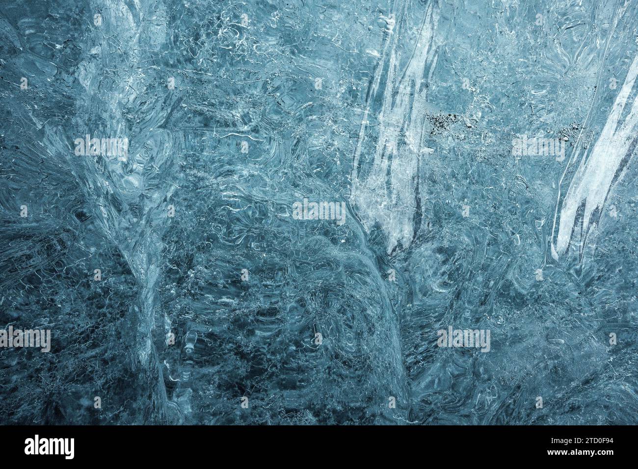 A close-up view showcasing the detailed patterns of frost and ice ...