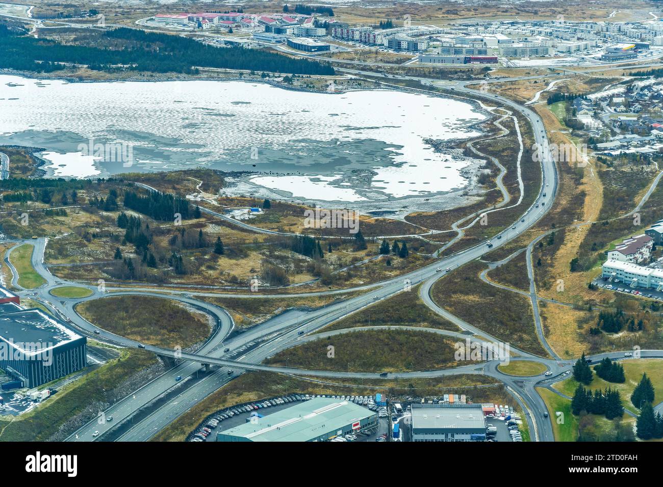 High-angle shot capturing the wintry mix of urban and natural ...