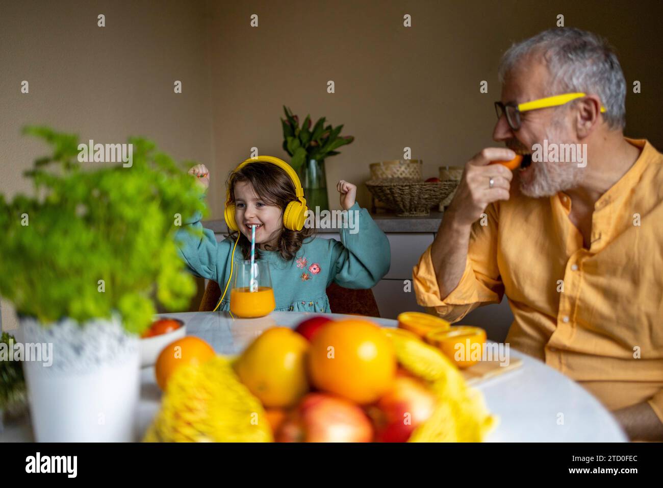 Grandfather and granddaughter dancing hi-res stock photography and ...
