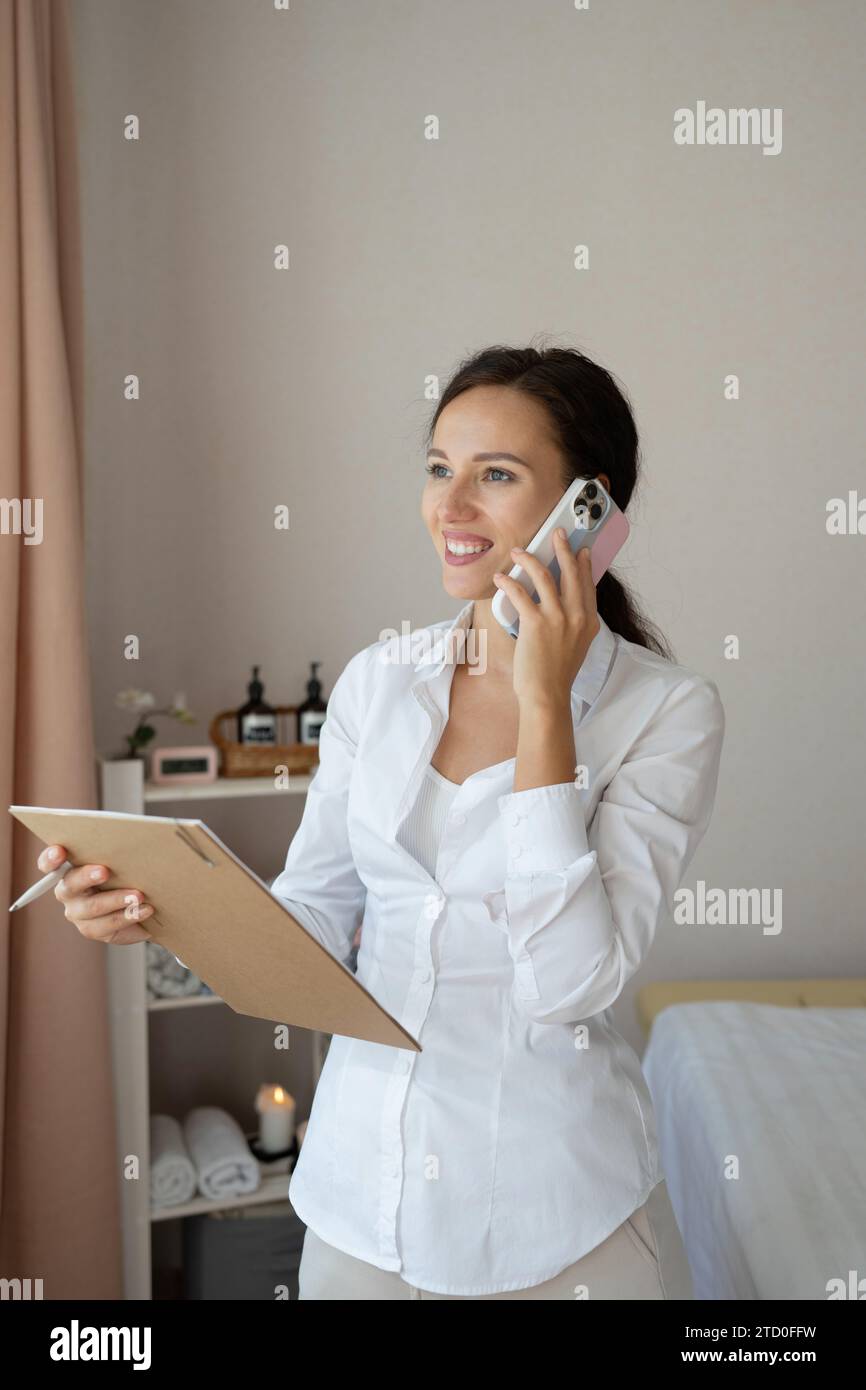 Female massage therapist in white hi-res stock photography and images ...