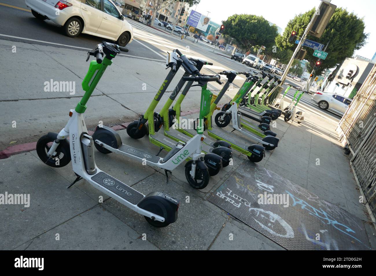 Los Angeles, California, USA 13th December 2023 Scooters on sidewalk in ...