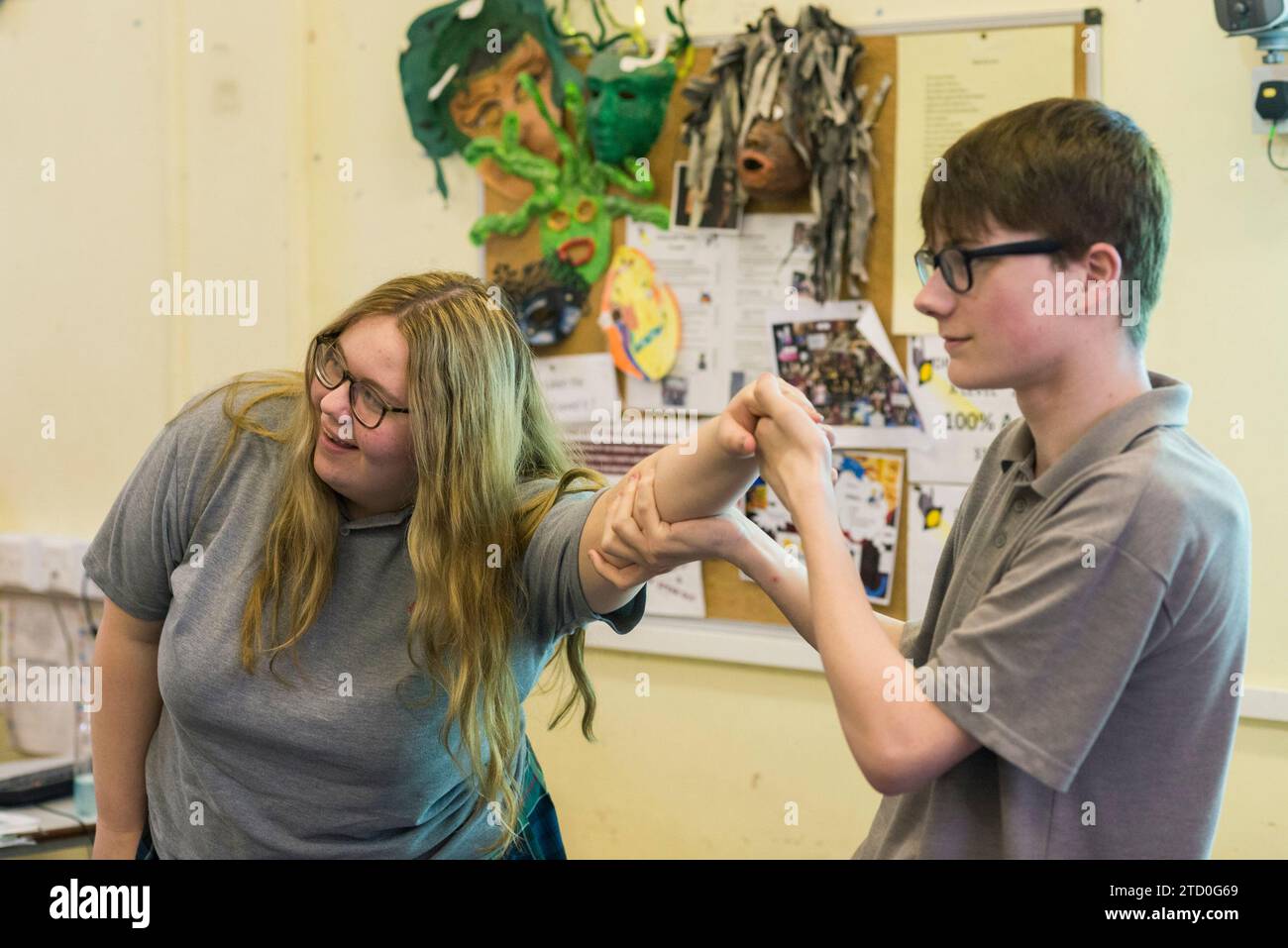 Students in the drama class room are rehearsing a performance for a ...