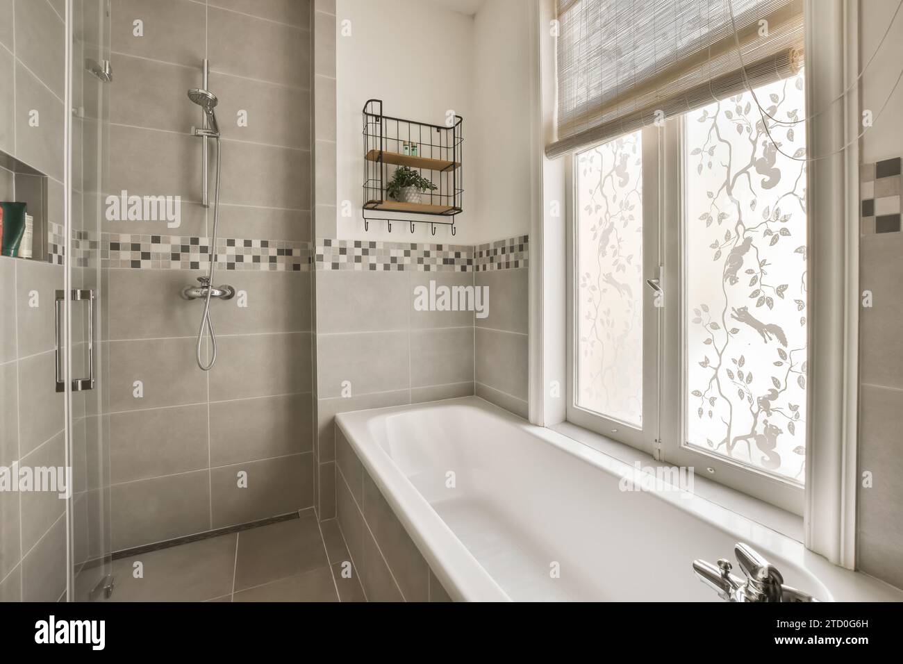 Shower booth by bathtub and window with pattern and blinds in bathroom ...