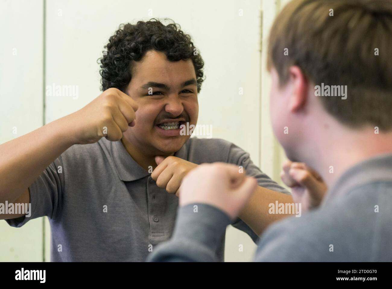 Students in the drama class room are rehearsing a performance for a ...