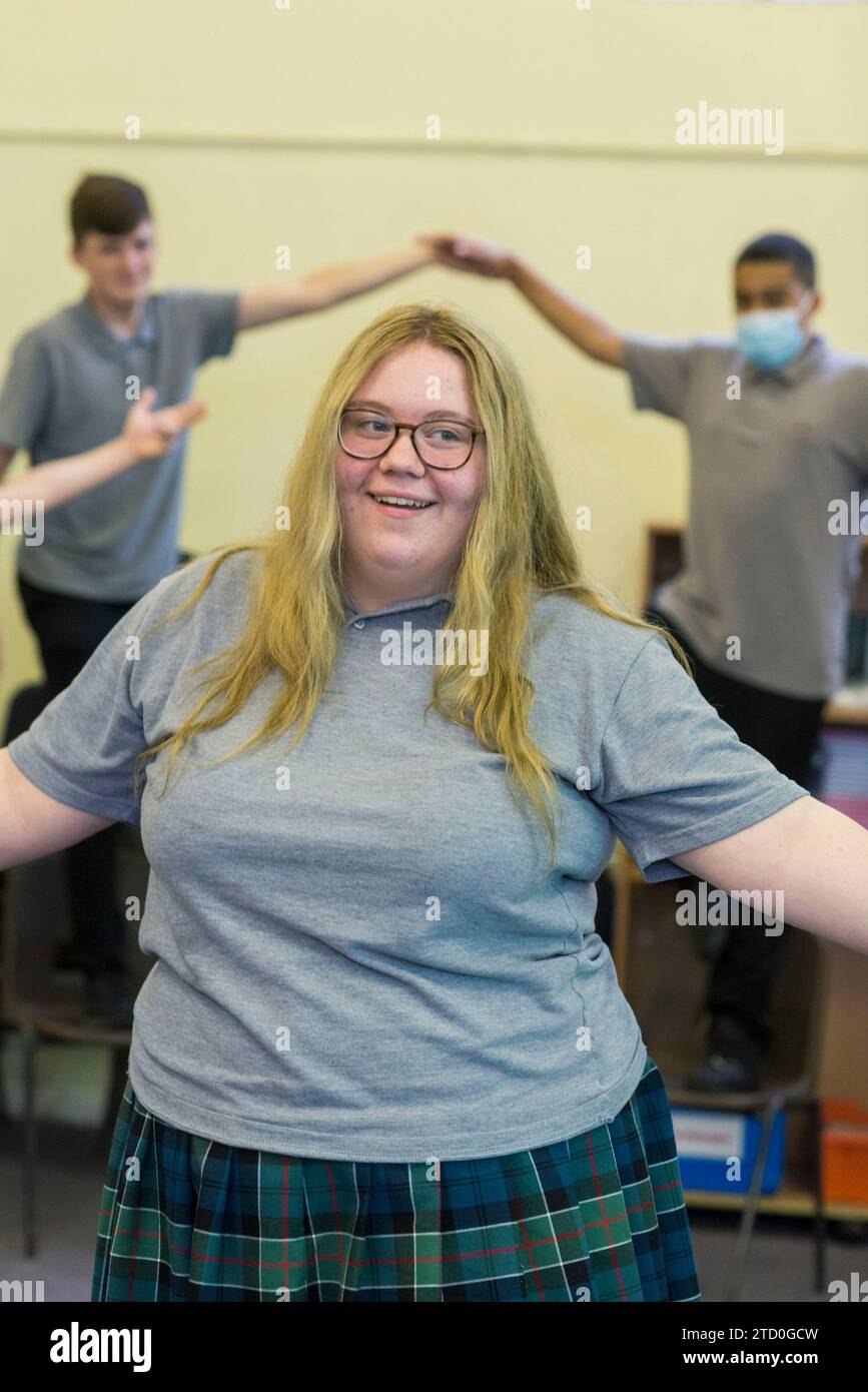 Students in the drama class room are rehearsing a performance for a ...