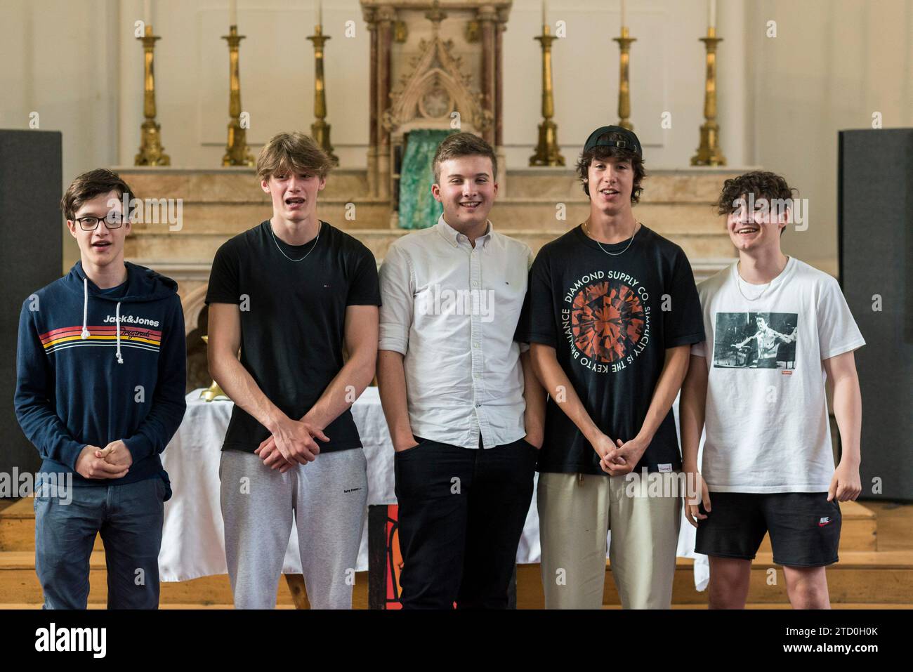A group of boys sing in a choir at school in the school Church Stock ...