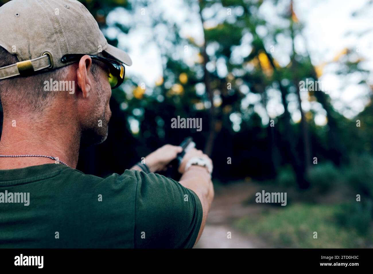 Crop unrecognizable middle aged special force army commando practicing ...