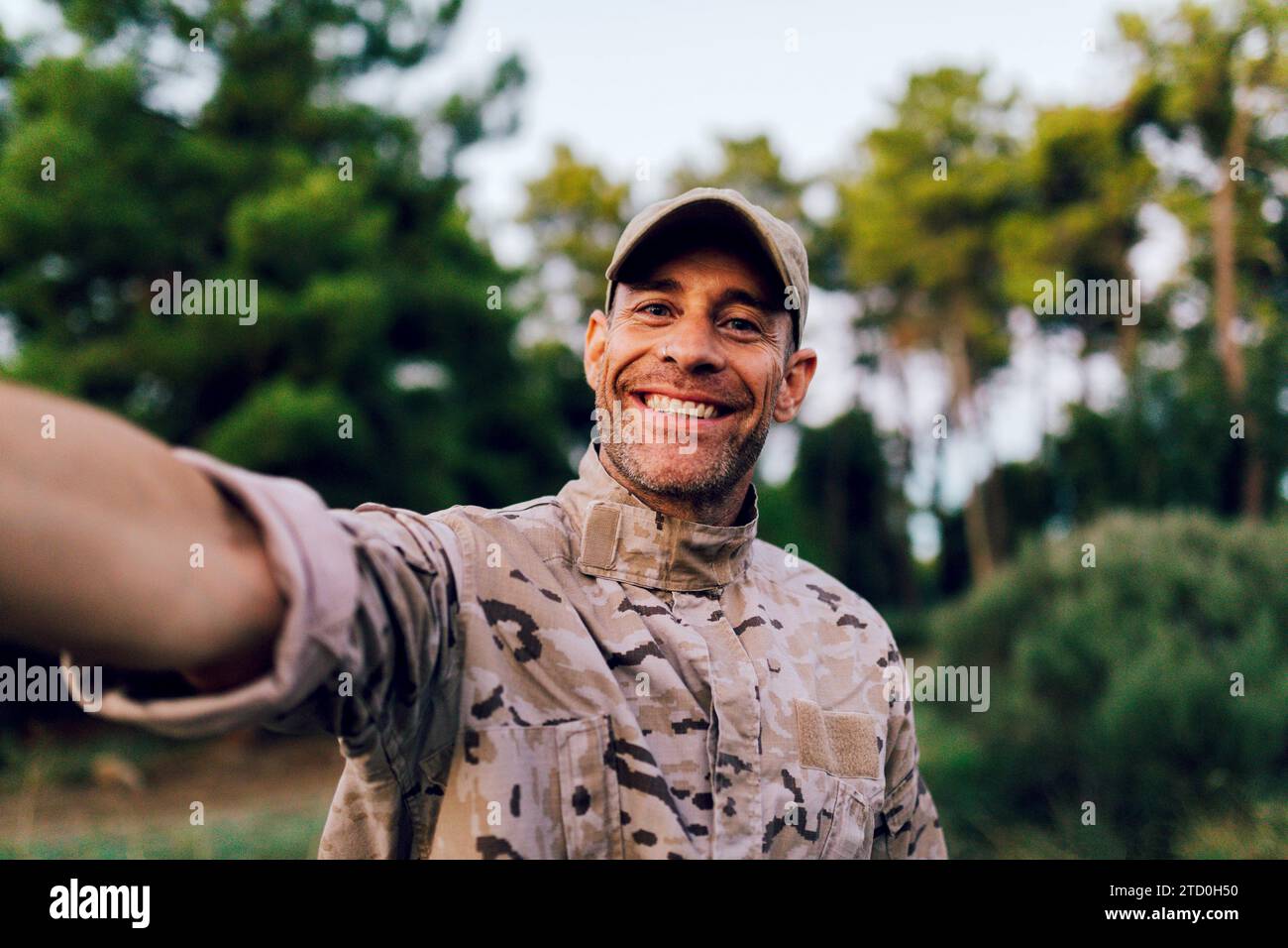 Smiling portrait of mature Caucasian special force commando wearing ...