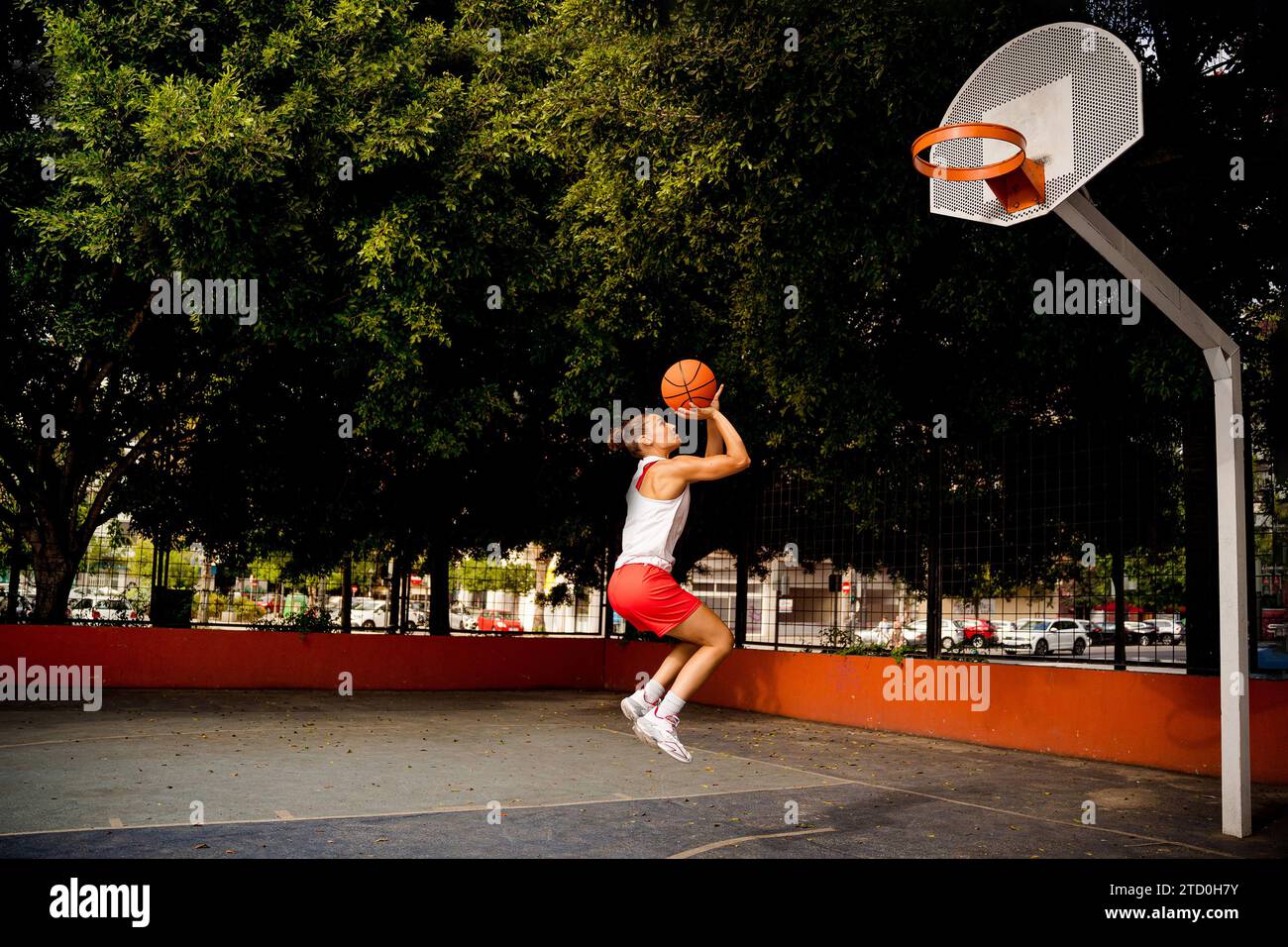 Woman basketball court jump hi-res stock photography and images - Alamy