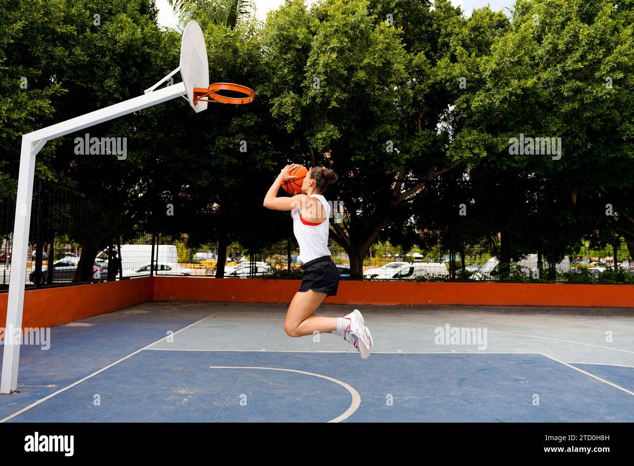 Woman basketball court jump hi-res stock photography and images - Alamy