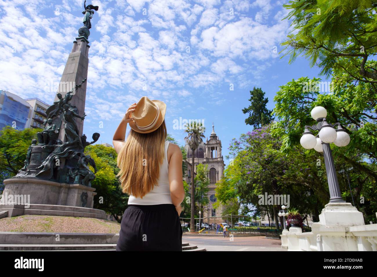 Tourism in Porto Alegre, Brazil. Back view of young traveler woman ...