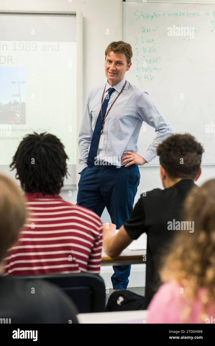 A teacher takes a lecture in a school class room Stock Photo - Alamy