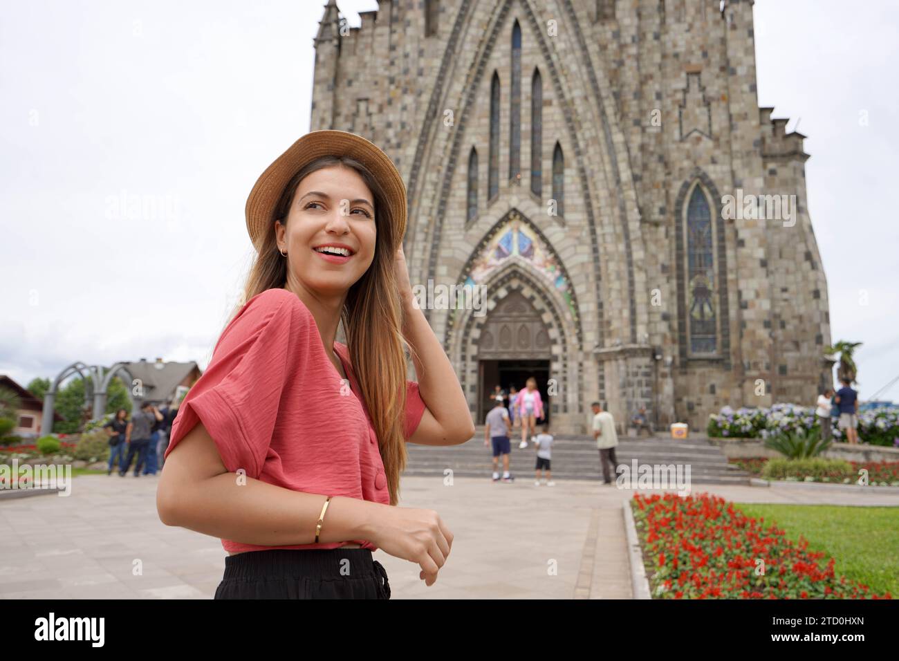 Stylish young woman visiting the town of Canela in the Serra Gaucha ...