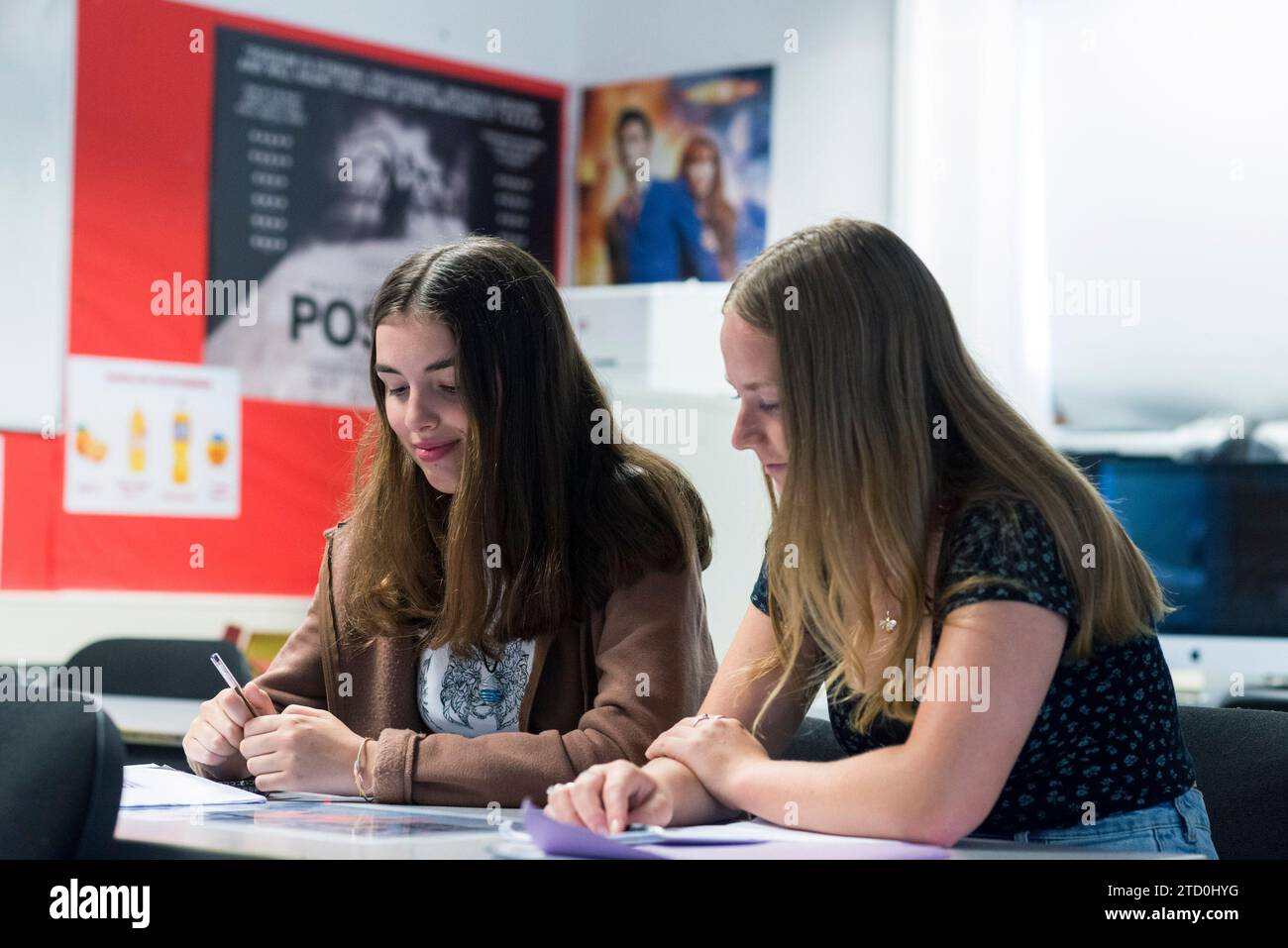 Pupils in a high school learning media studies in a class room with ...