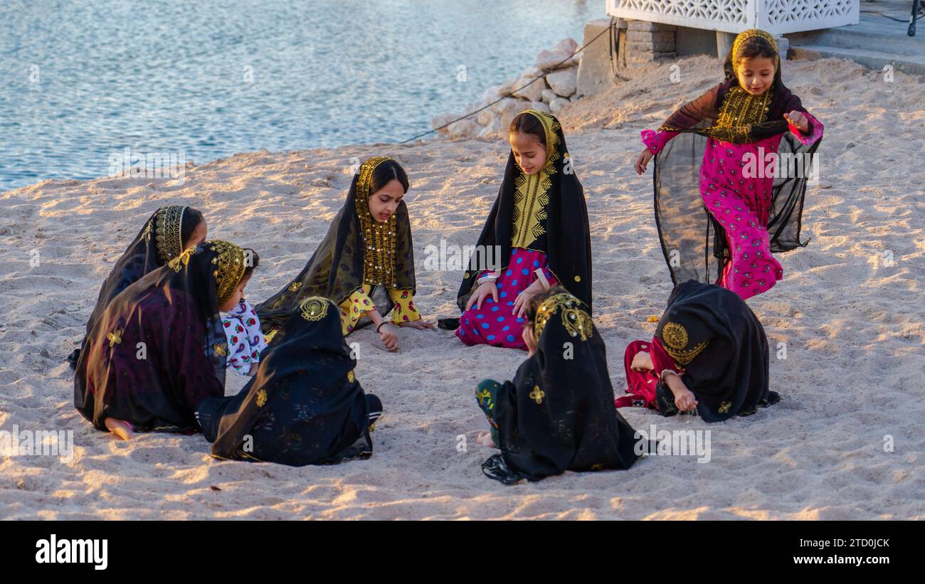 Doha, qatar- December 18, 2023 : Qatari girls in their national attire ...