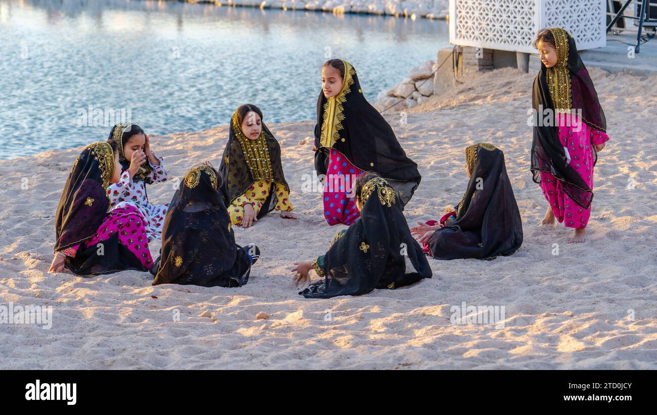 Doha, qatar- December 18, 2023 : Qatari girls in their national attire ...