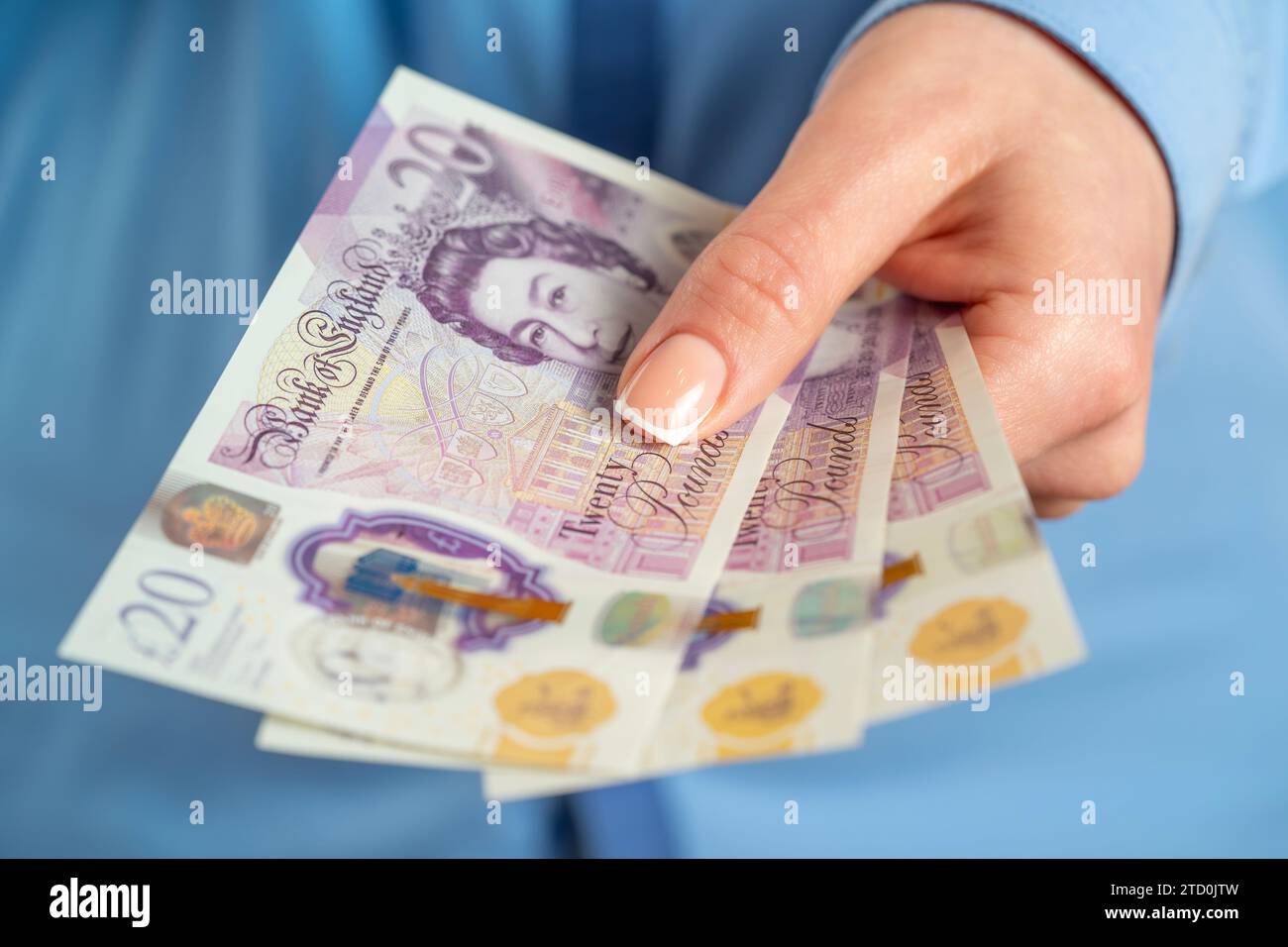 Hand counting british pounds hi-res stock photography and images - Alamy