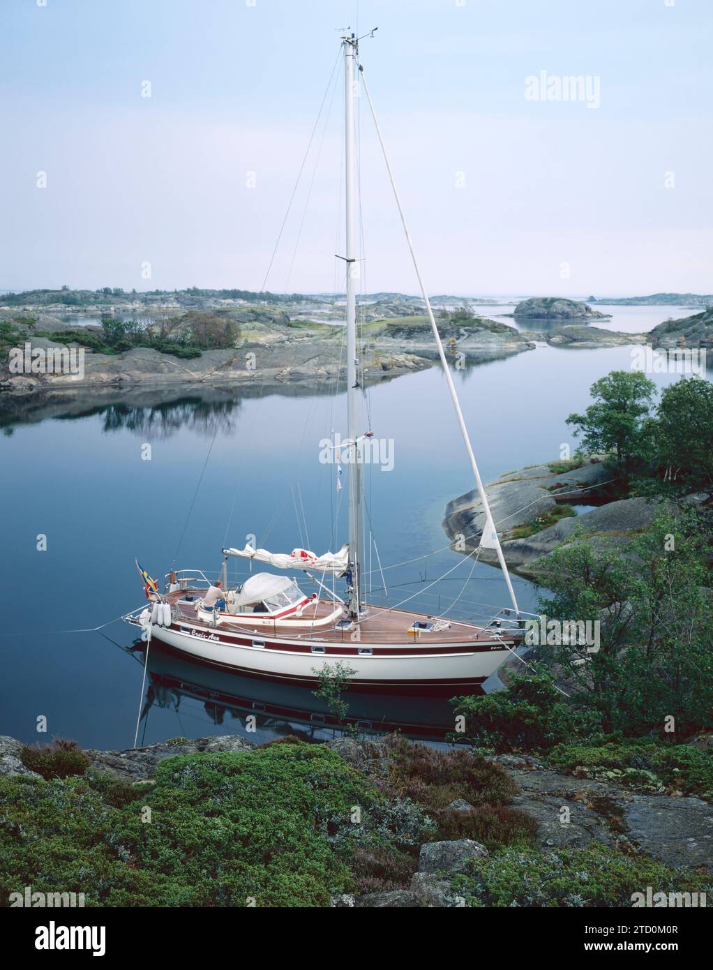 Sailing boat anchored in Swedish archipelago Stock Photo - Alamy