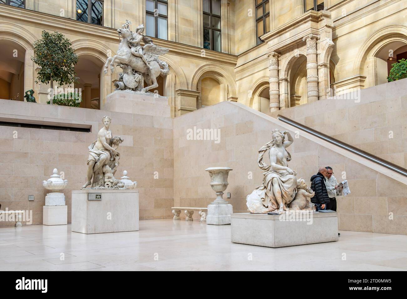 Sculptures in the glass-roofed courtyard known as Cour Marly in the ...