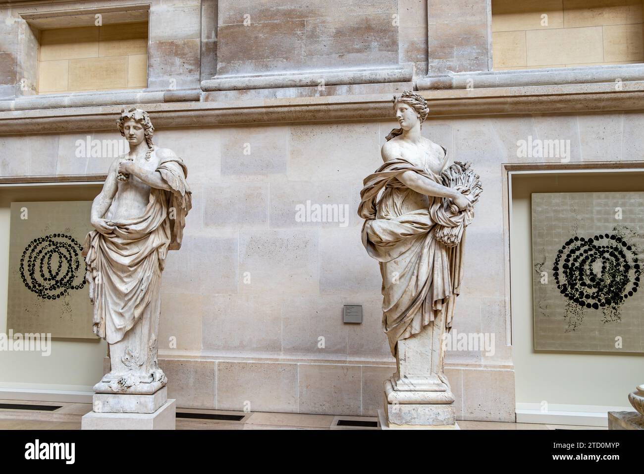 Sculptures in the glass-roofed courtyard known as Cour Marly in the ...