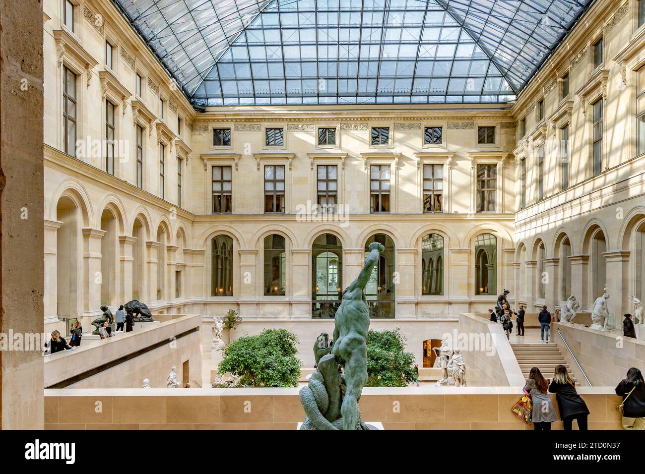 Sculptures in the glass-roofed courtyard known as Cour Marly in the ...