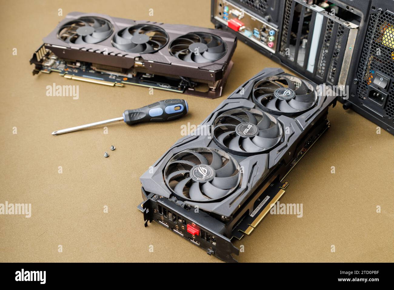 graphics card upgrading concept, two gaming graphics cards near desktop ...