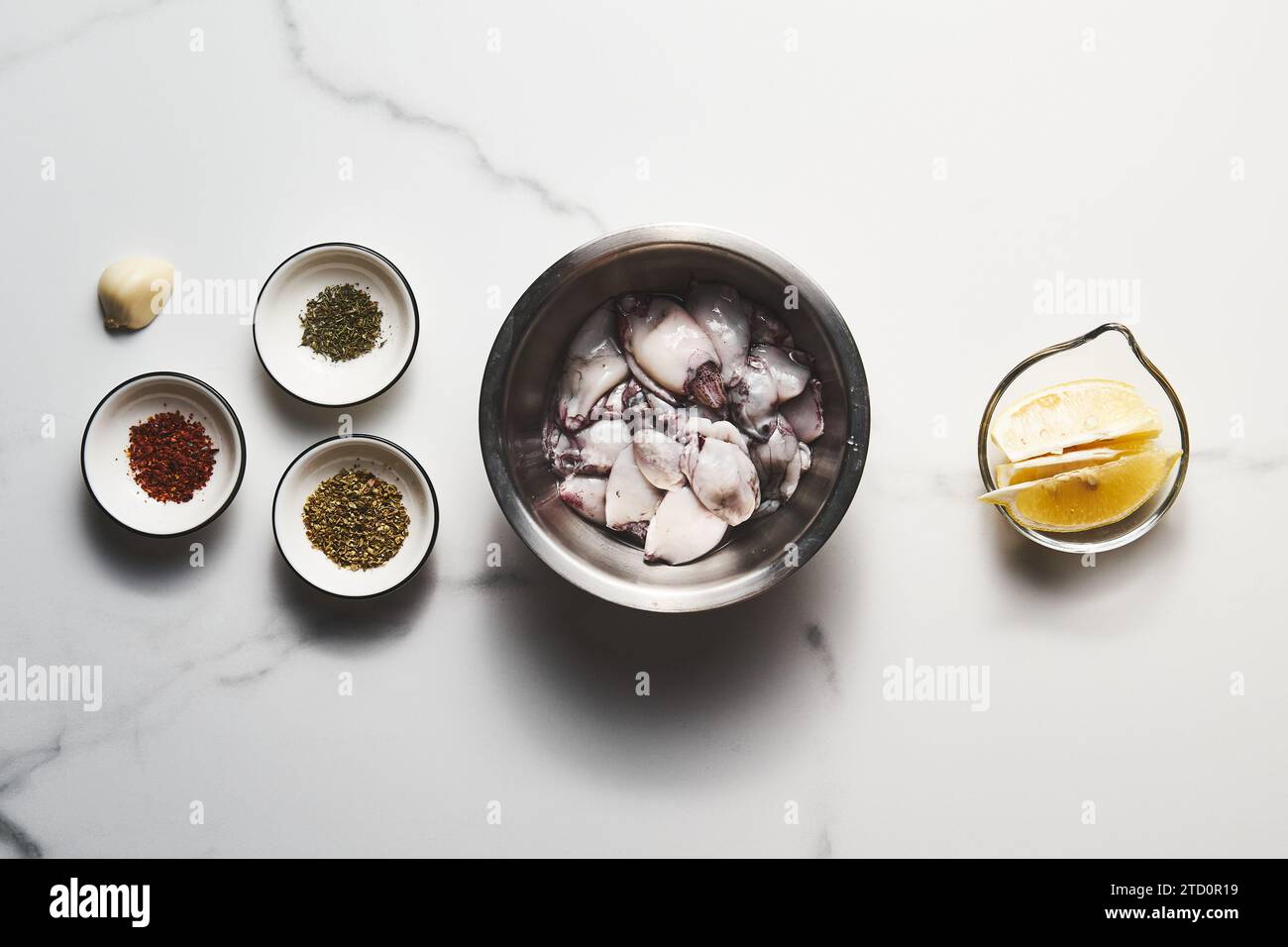 Sauteed Calamari Ingredients. Baby Calamari cooked with oregano, thyme ...