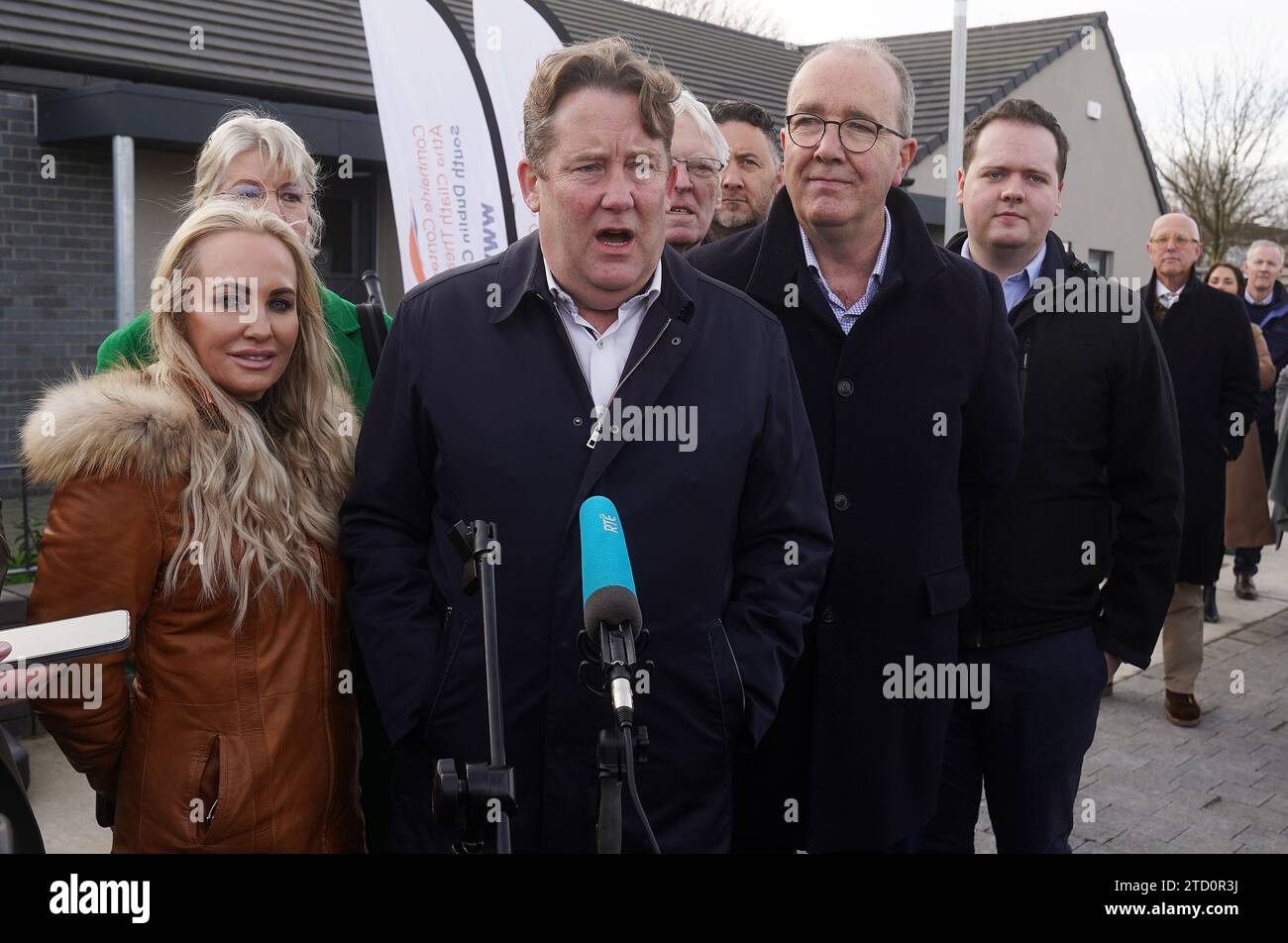 Minister for Housing Darragh O’Brien (centre) speaking to the media as ...