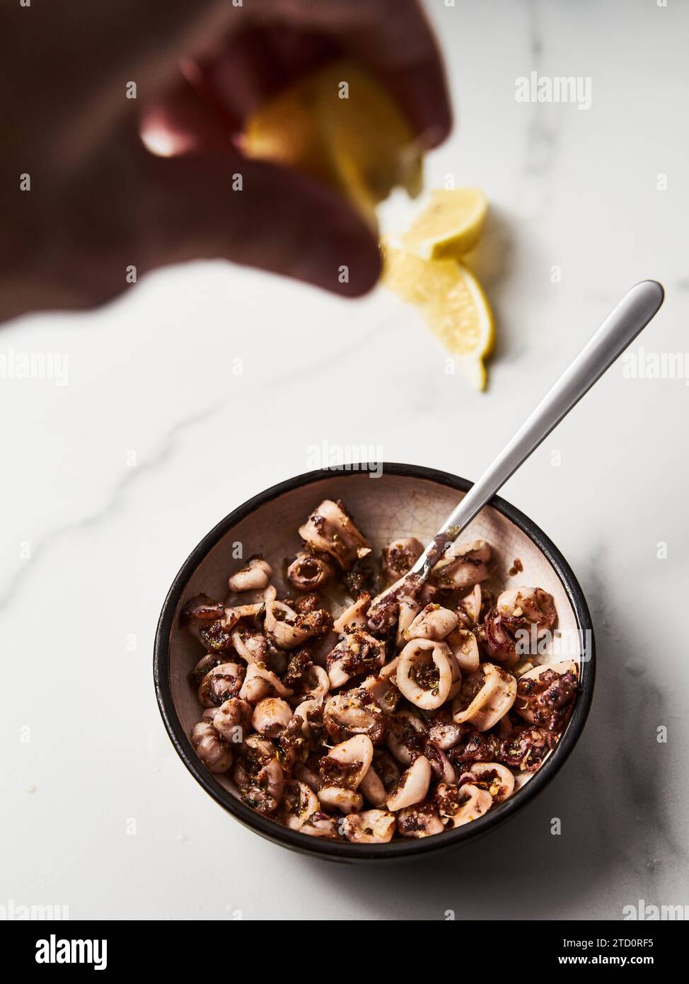 Sauteed Calamari. Baby Calamari cooked with oregano, thyme and garlic ...