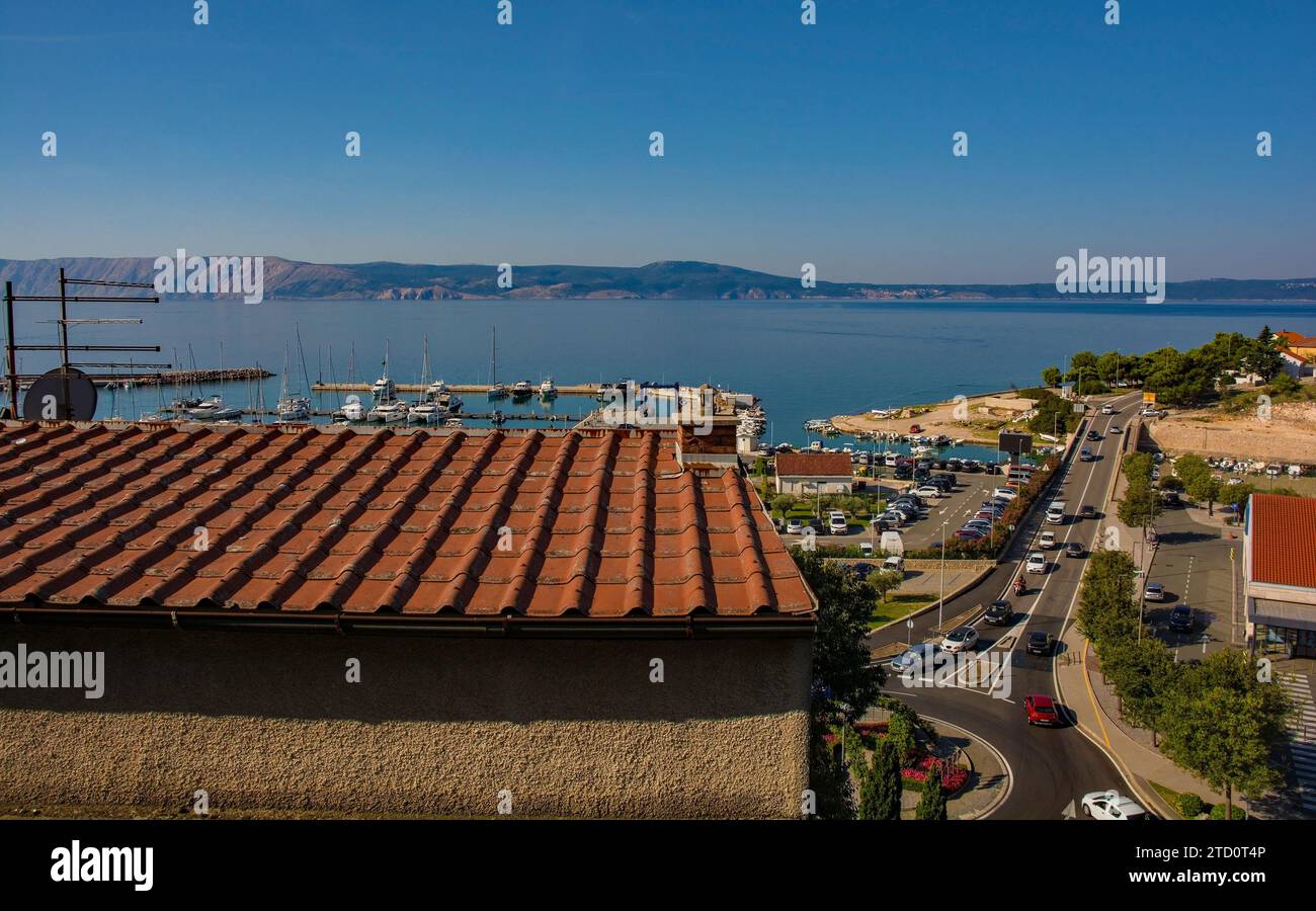 A view of the port area over the rooftops in Novi Vinodolski, Primorje ...