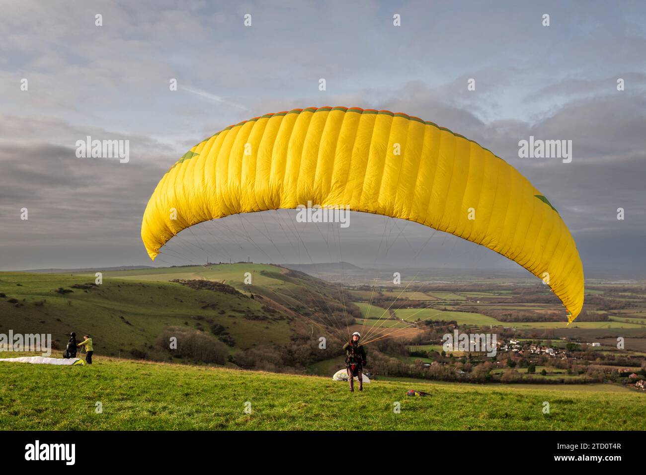 Brighton, December 15th 2023: A paraglider preparing to take off from Devil's Dyke in the South ...