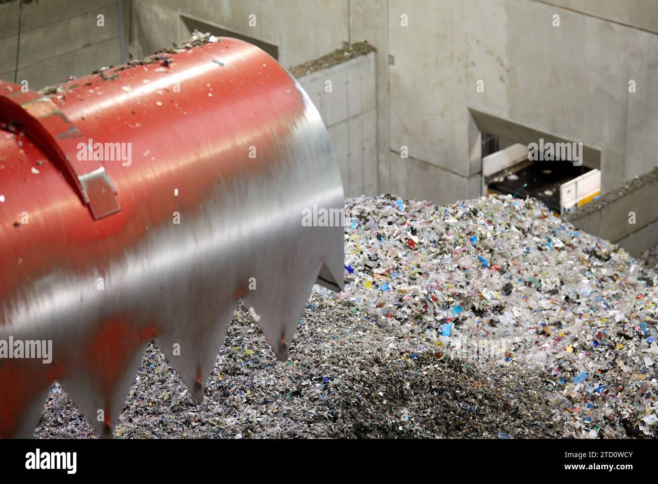 Detalied view of jaws of red grab against fuel obtained from waste (RDF ...