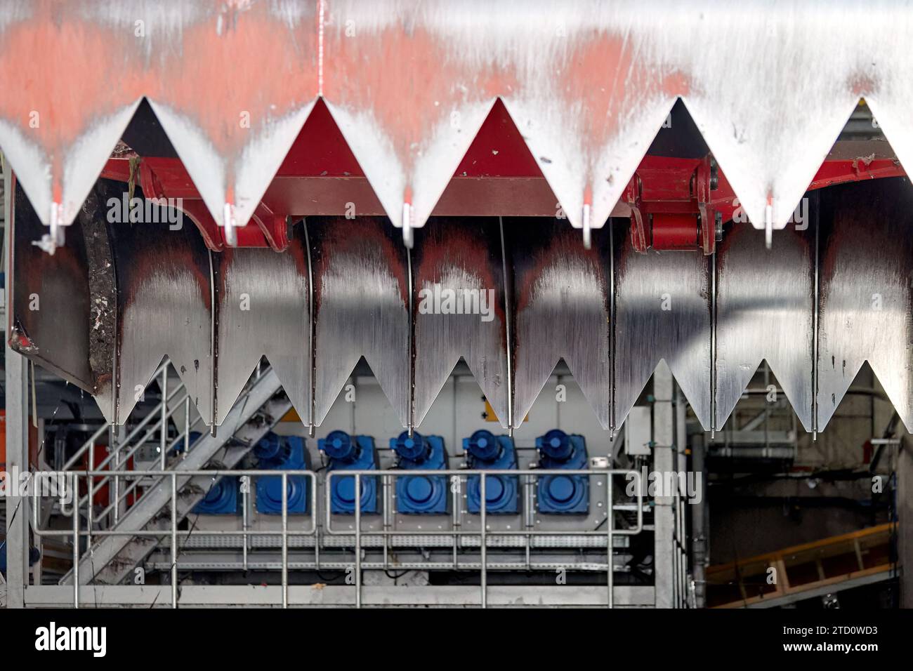 Detalied view of jaws of red grab. Handling and Transportation of fuel ...